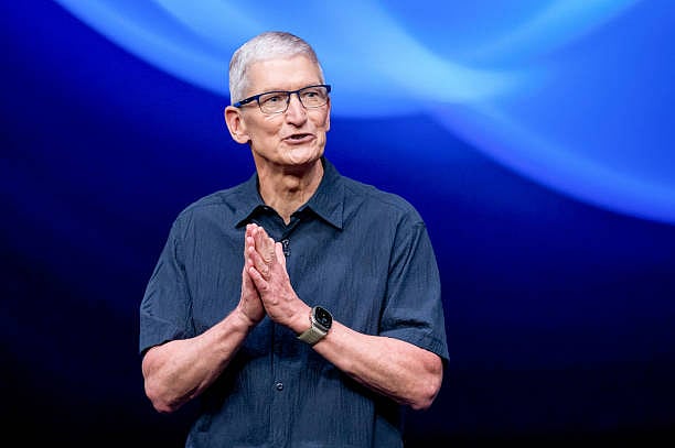Apple CEO Tim Cook dives into Holi spirit with a splash of colour and ...