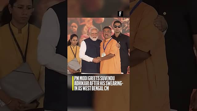 PM Modi greets Suvendu Adhikari after his swearing-in as West Bengal CM ...